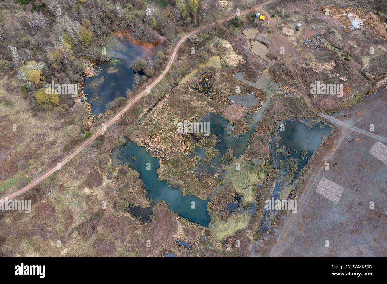 Messel, Germany. 13th Apr, 2025. Drone image of the Messel pit. In the ...