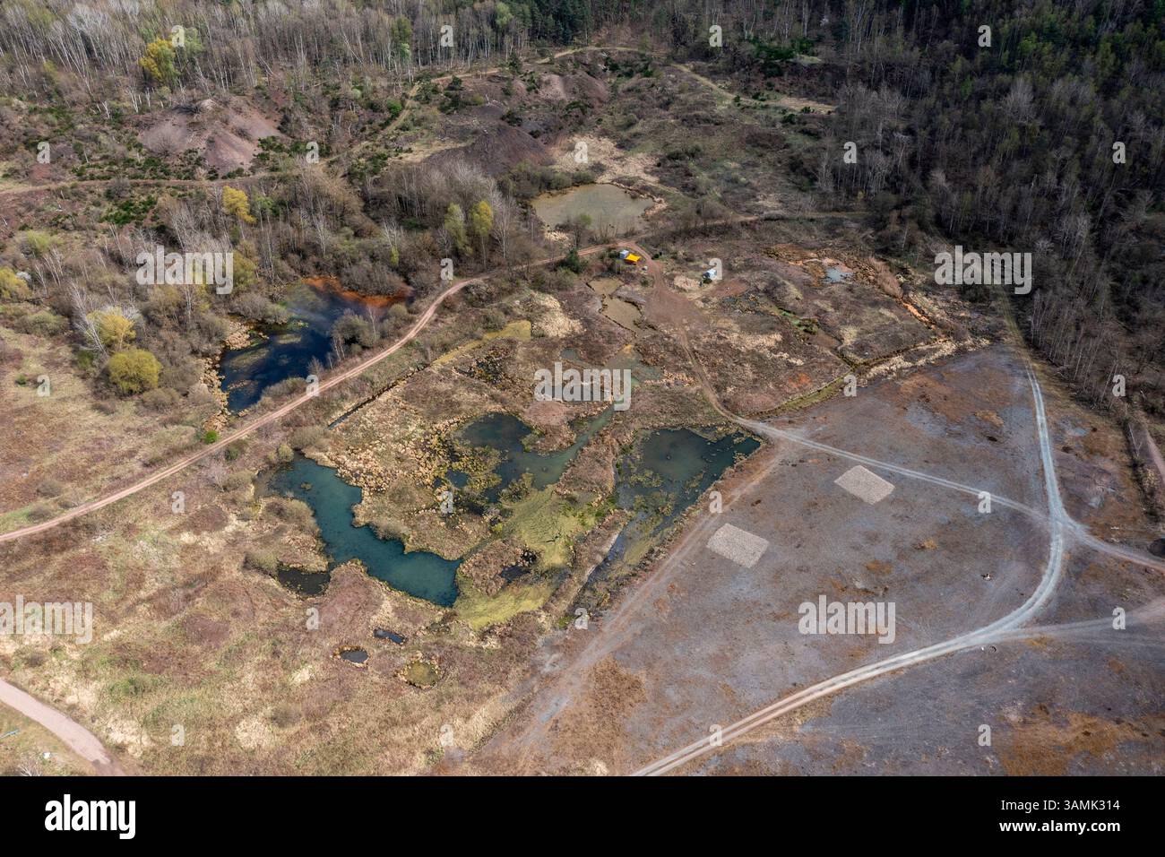 Messel, Germany. 13th Apr, 2025. Drone image of the Messel pit. In the ...