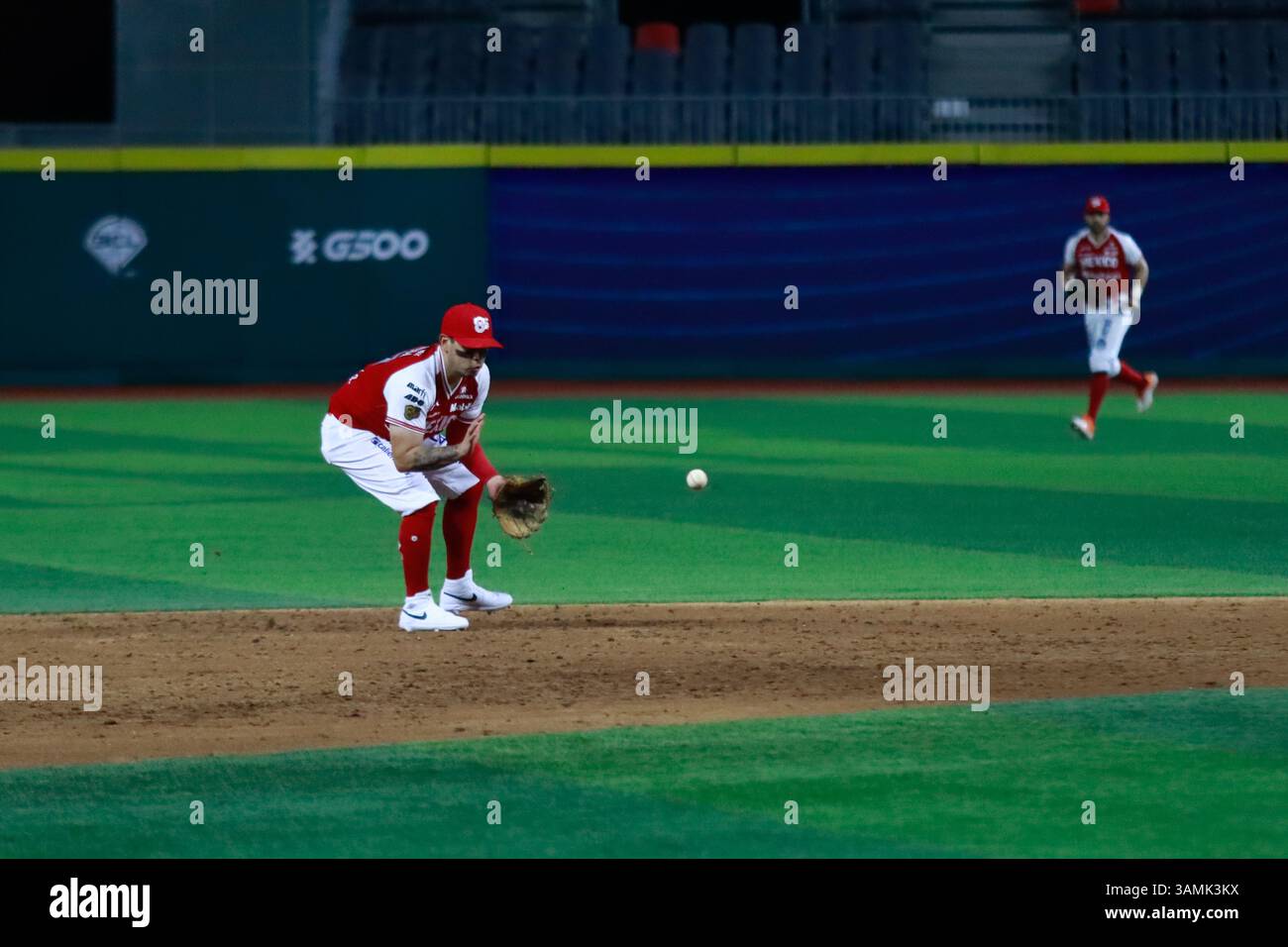 Juan Carlos Gamboa #47 of Diablos Rojos del Mexico catches the ball ...