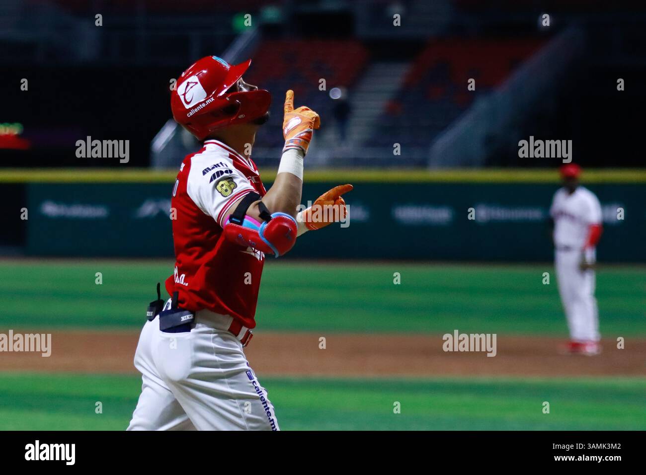 Luis Liberato #18 of Diablos Rojos del Mexico celebrates during the ...