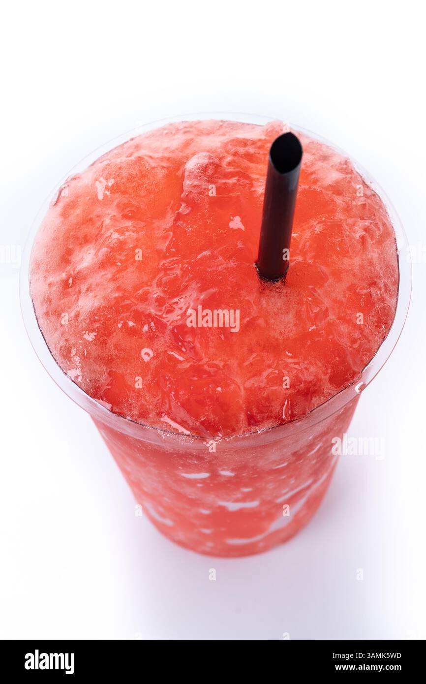 Red strawberry slushie isolated on white background Stock Photo - Alamy