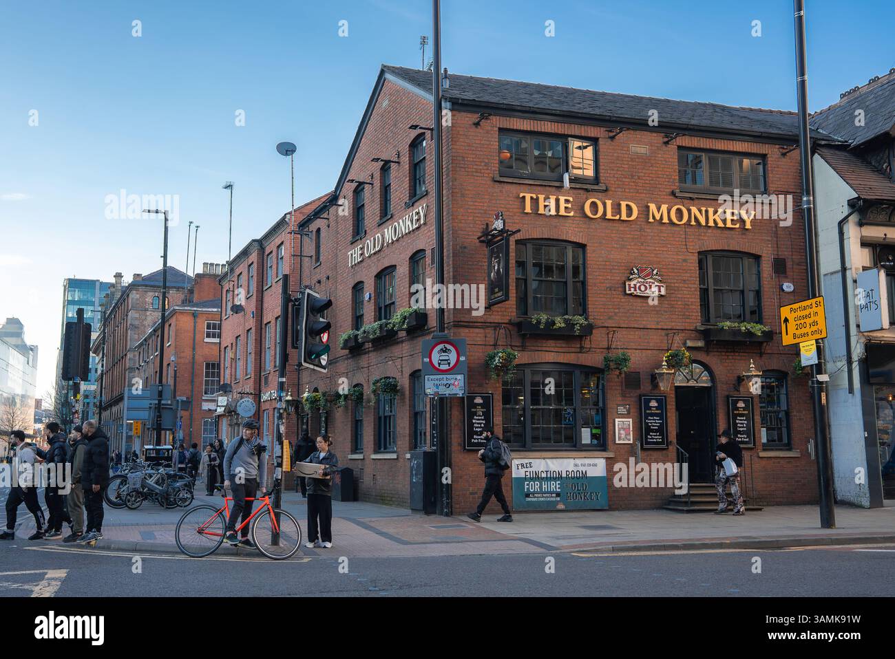 Street View in Manchester Featuring The Old Monkey Pub Stock Photo - Alamy