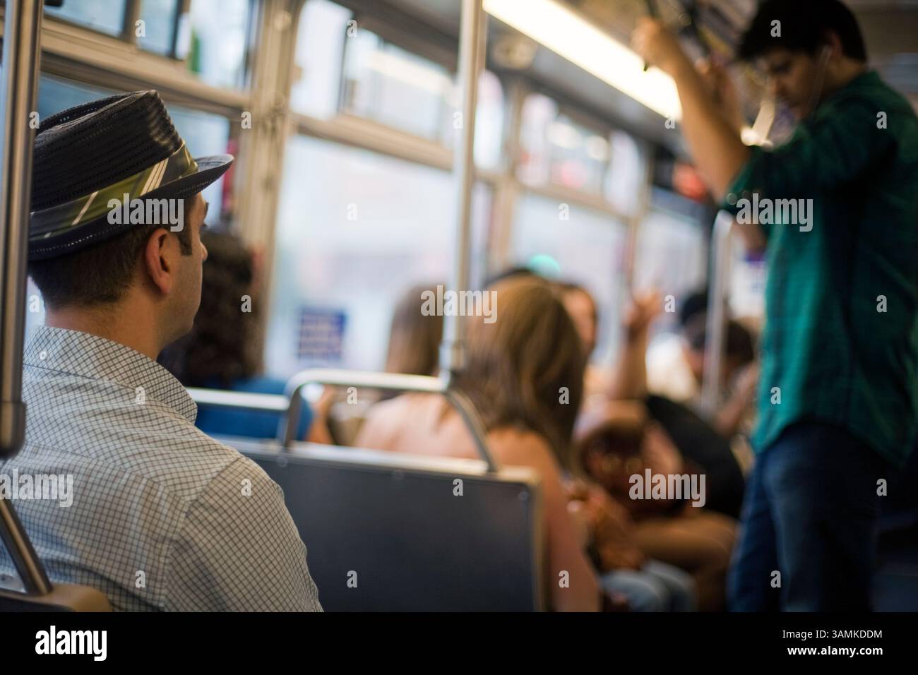 Commuters riding on a public bus Stock Photo - Alamy