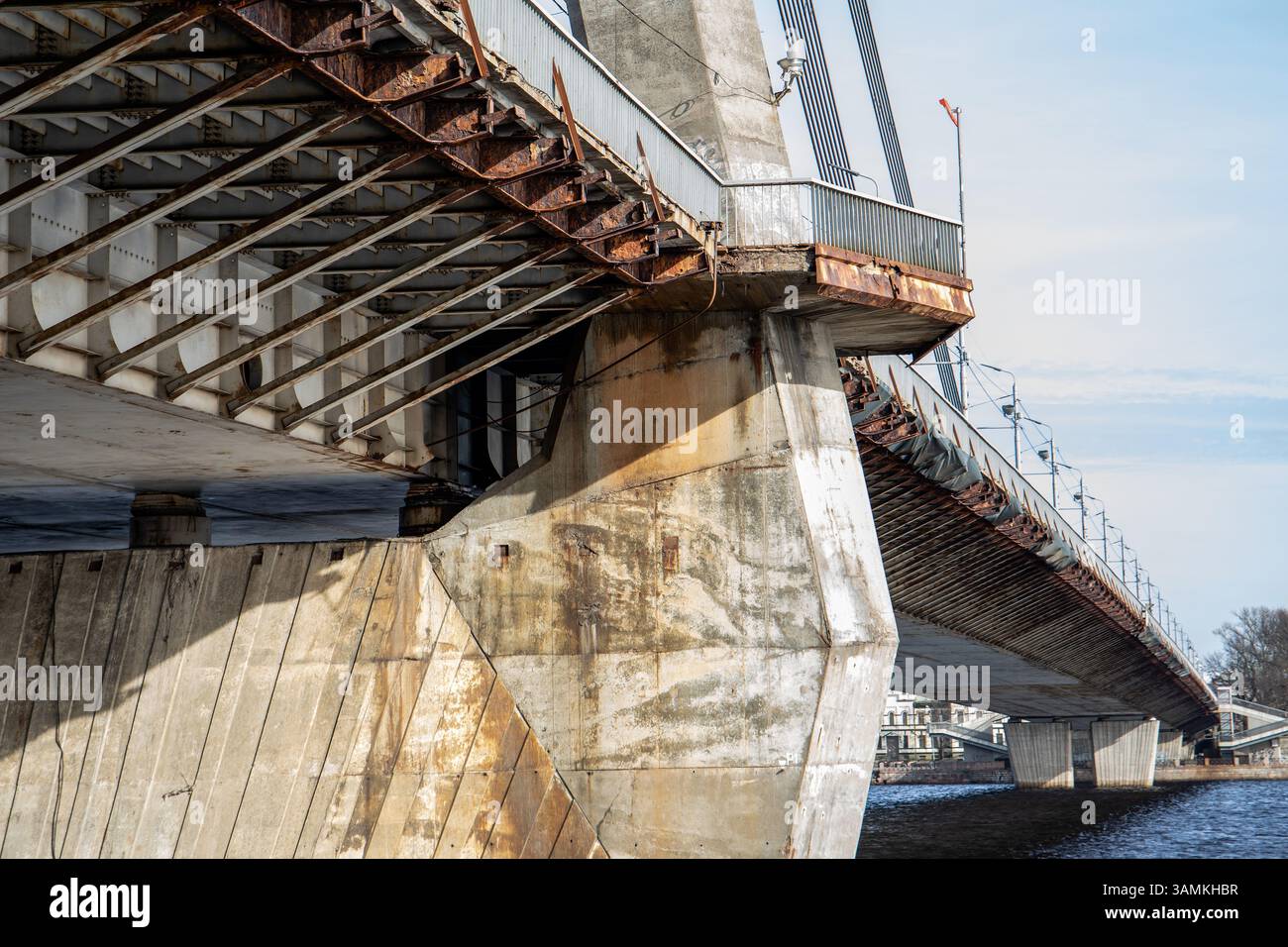 Rusty Bridge Pillar and Weathered Steel Supports under a Suspension ...