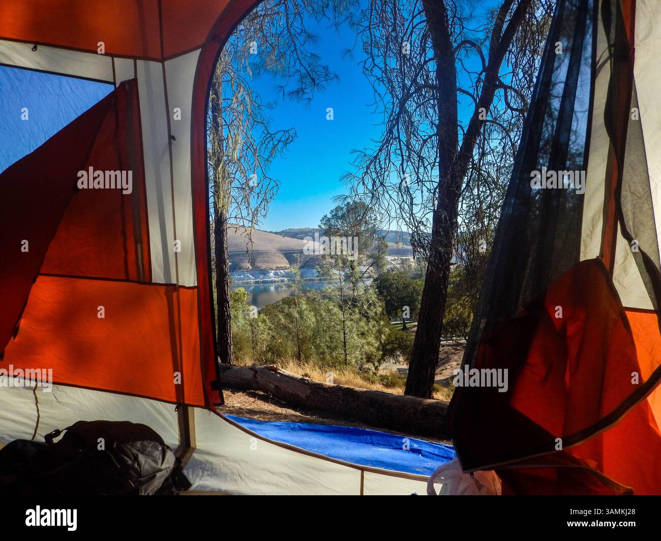 Scenic lake and hills viewed from inside a colorful camping tent Stock ...