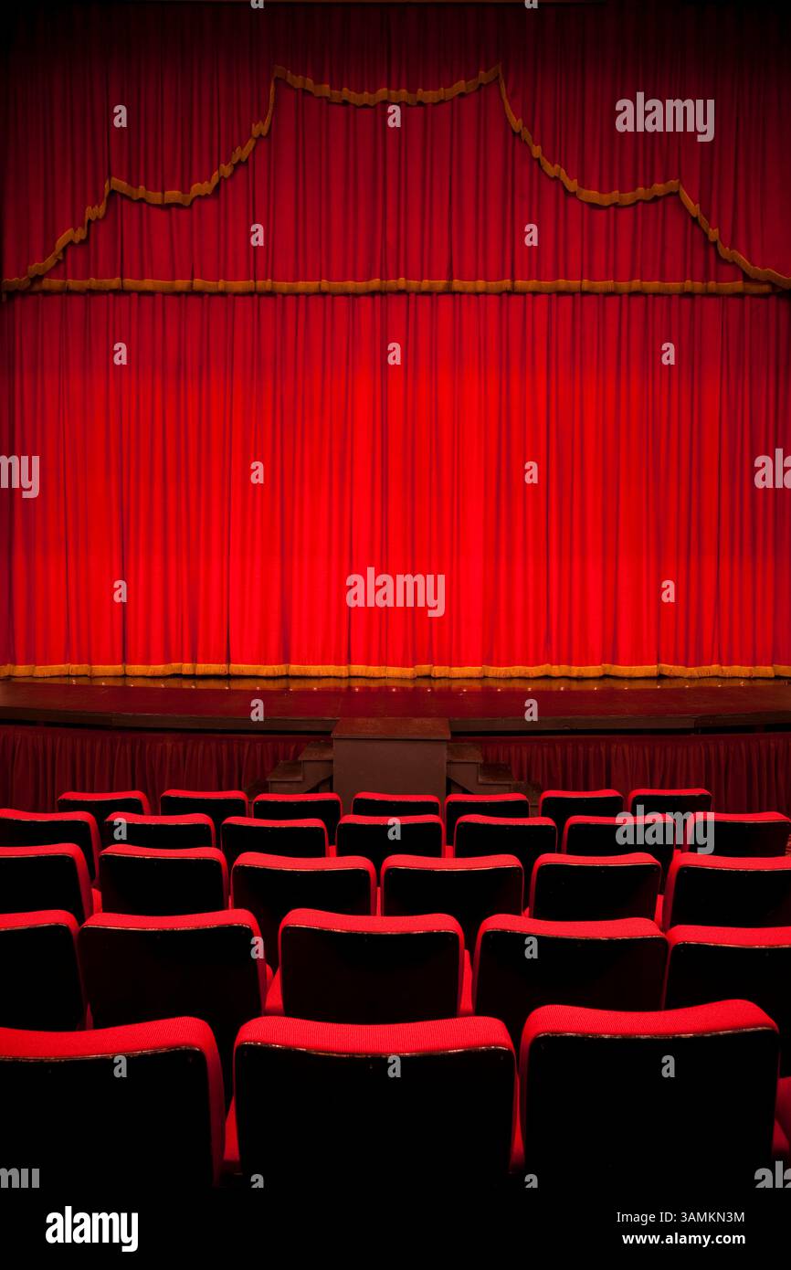 Empty Theater Seats Facing Red Velvet Stage Curtain Stock Photo - Alamy
