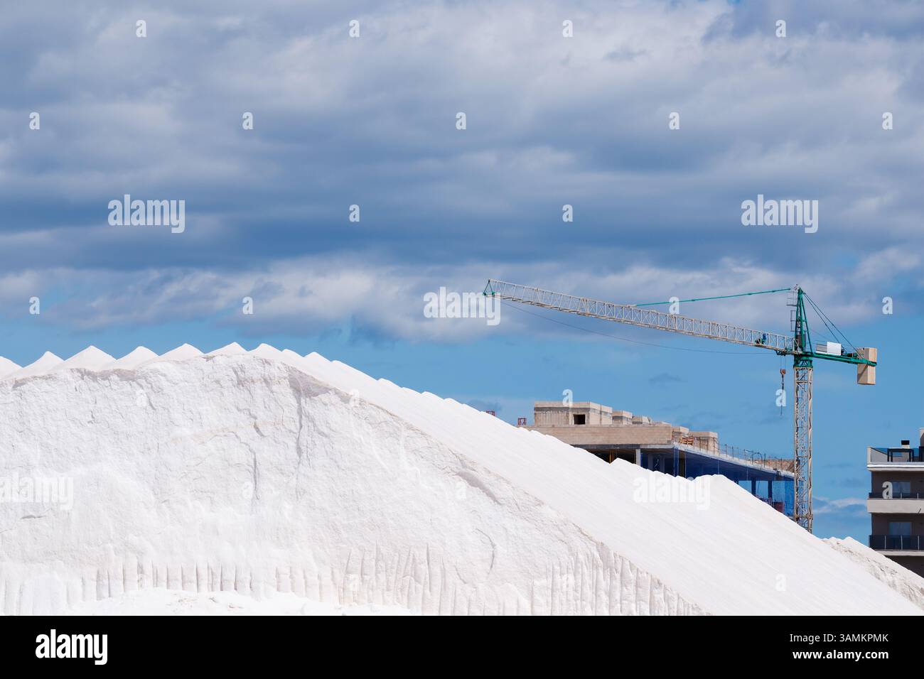 Salt mountains with tower crane in the Santa Pola salt pans Stock Photo ...
