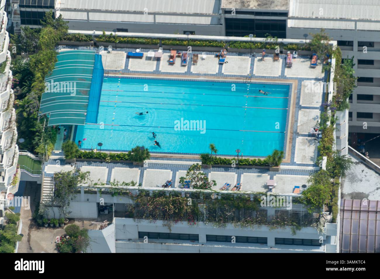 Looking down at a neighbouring hotel swimming pool from the King Power ...