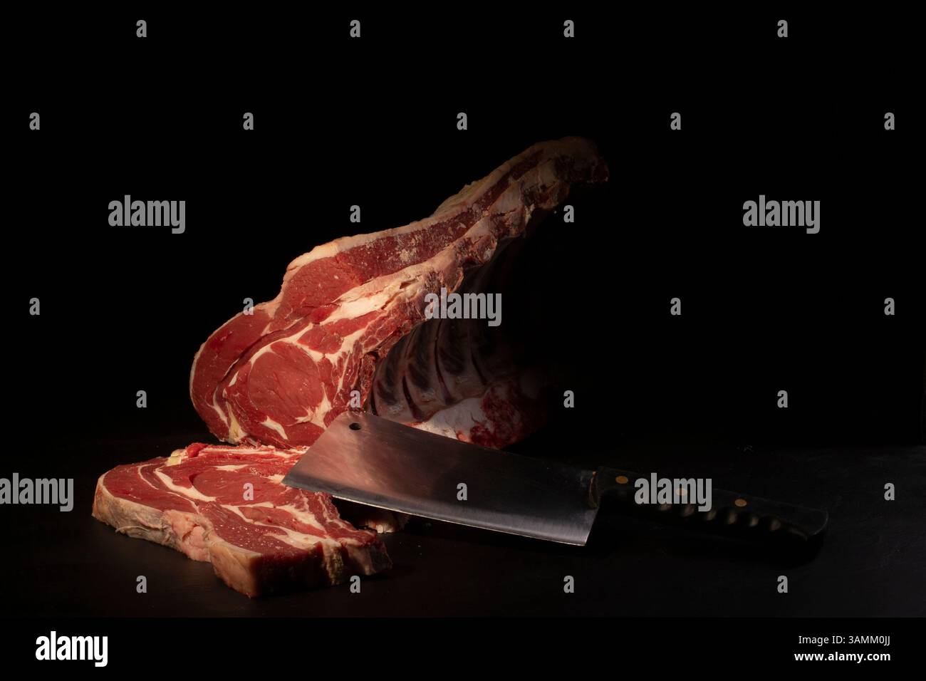 cutting and chopping beef loin Stock Photo - Alamy