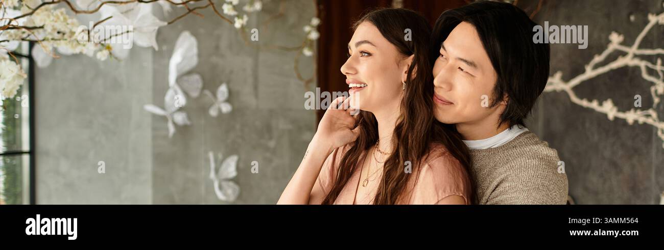 A joyful couple embraces each other while meticulously getting ready ...