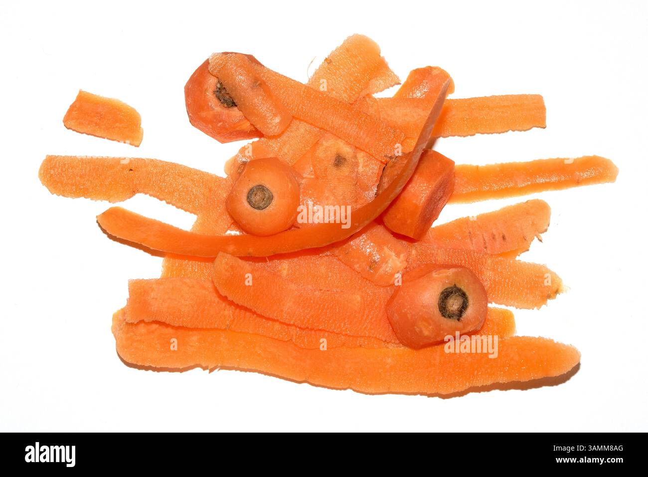 Close up of carrot scrap peelings food waste for compost on white ...