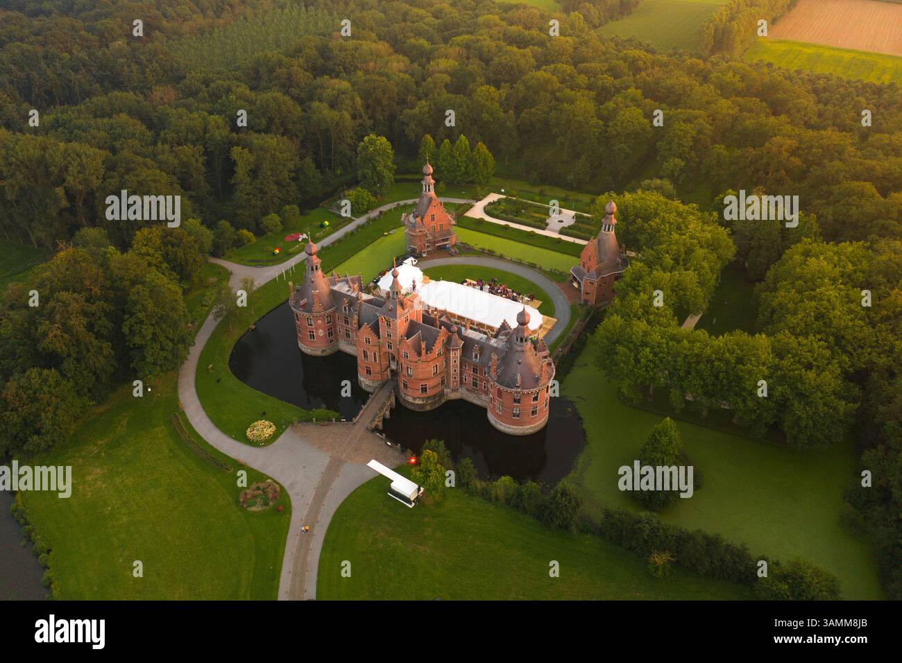 Aerial view of Ooidonk castle during sunset, situated near Gent ...