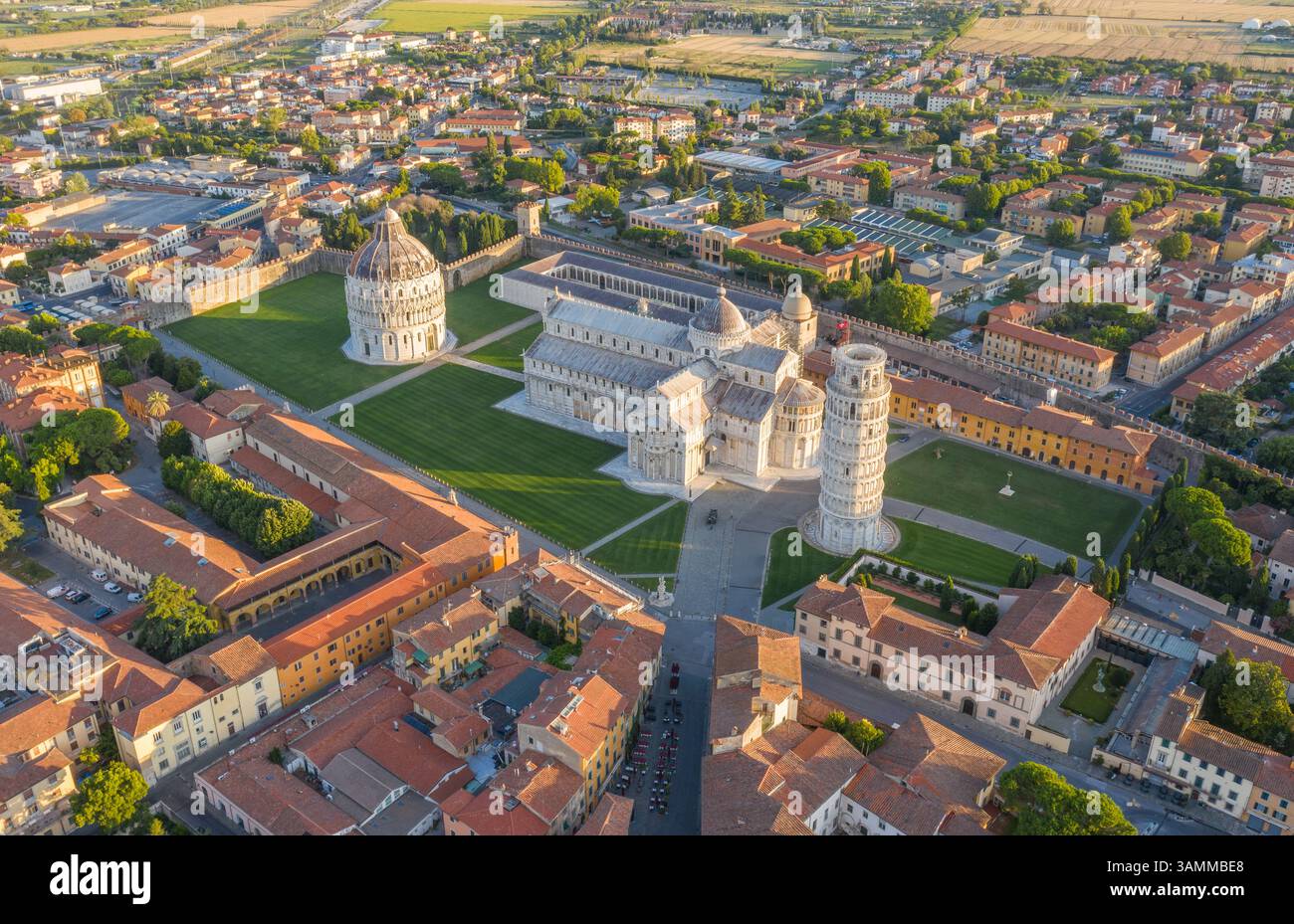 Aerial view of leaning tower of Pisa at sunrise in Italy Stock Photo ...
