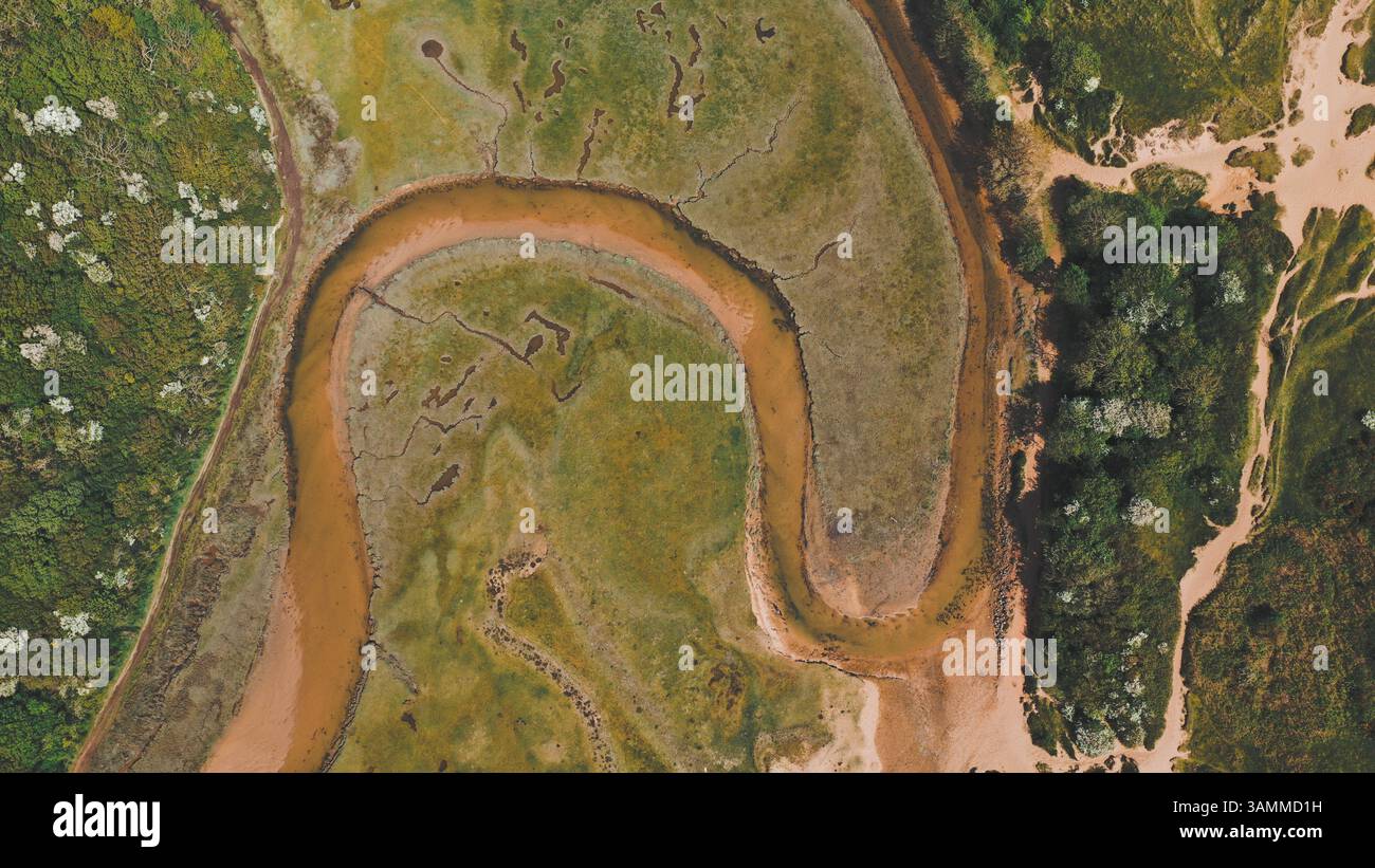 Aerial view of beatiful river meander in wonderful green Three Cliffs Bay, Wales Stock Photo - Alamy