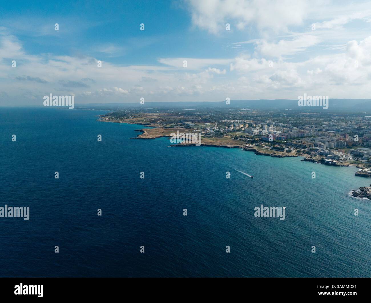 Aerial view of beautiful coastal town with scenic shoreline and vibrant ...