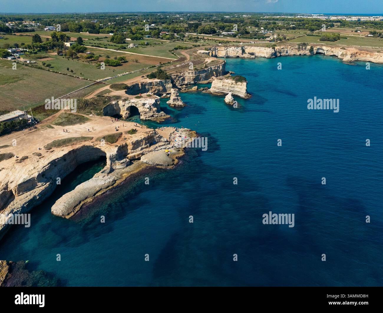 Aerial view of beautiful beach Torre Sant'Andrea with rugged cliffs and ...