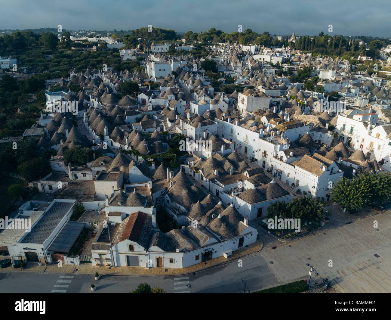 Aerial view of charming trulli buildings and picturesque rooftops in ...
