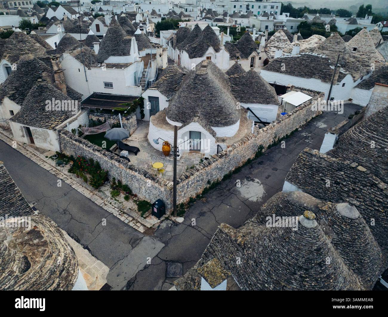 Aerial view of charming trulli rooftops and picturesque streets in the ...