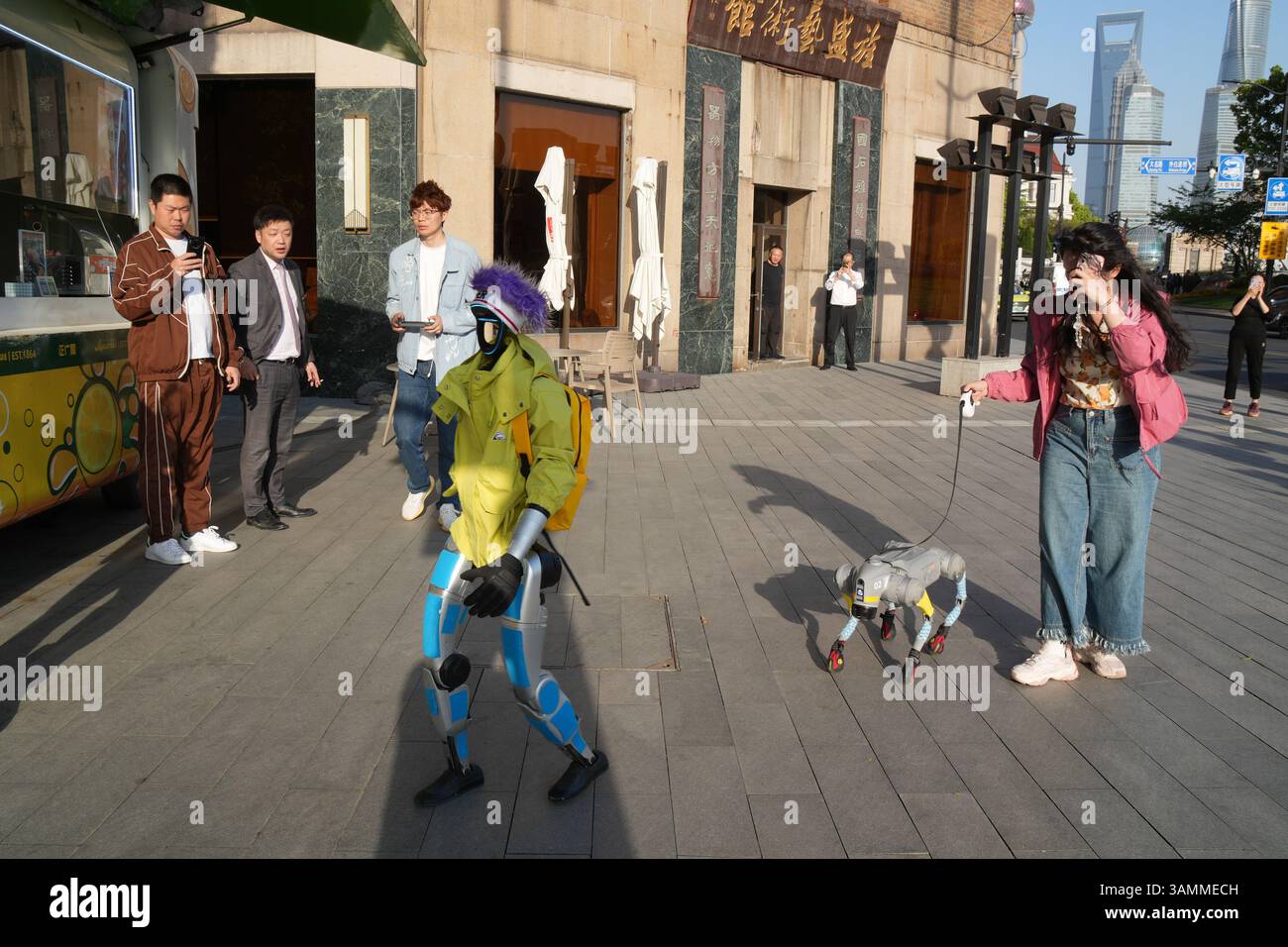 SHANGHAI, CHINA - APRIL 14, 2025 - A humanoid robot and a robot dog of ...