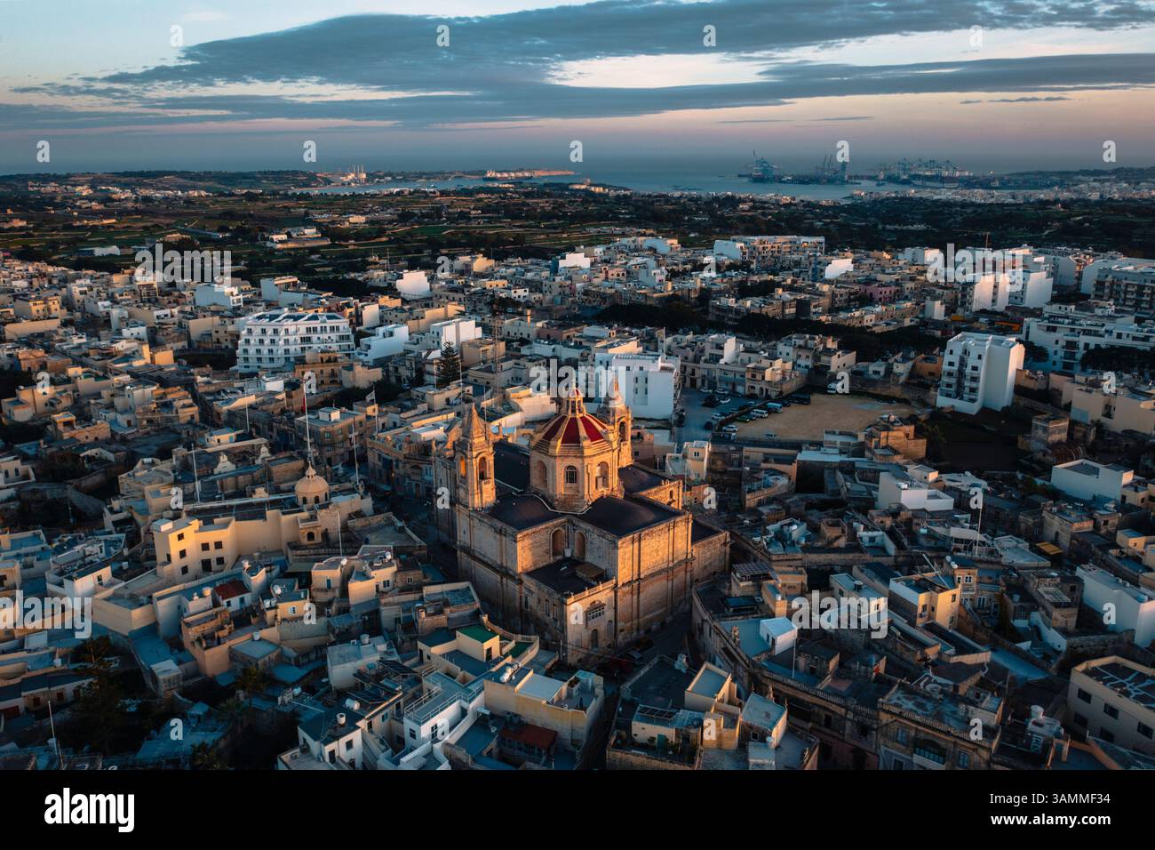Aerial view of the beautiful parish church of Mellieha surrounded by ...