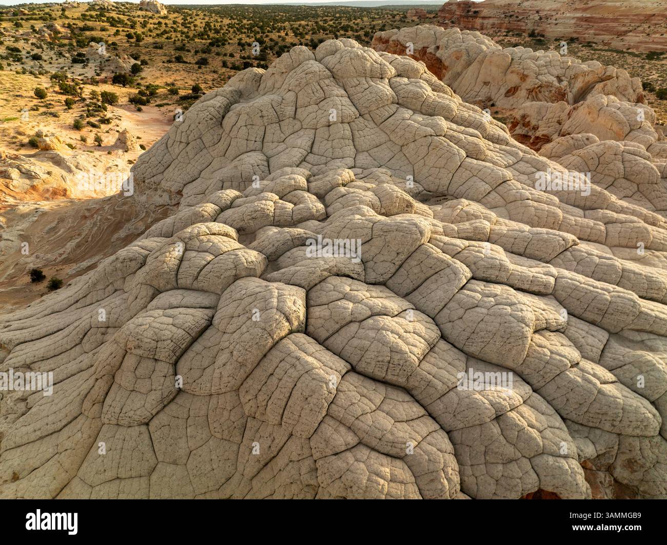 Aerial view of majestic rock formations in a barren desert landscape ...