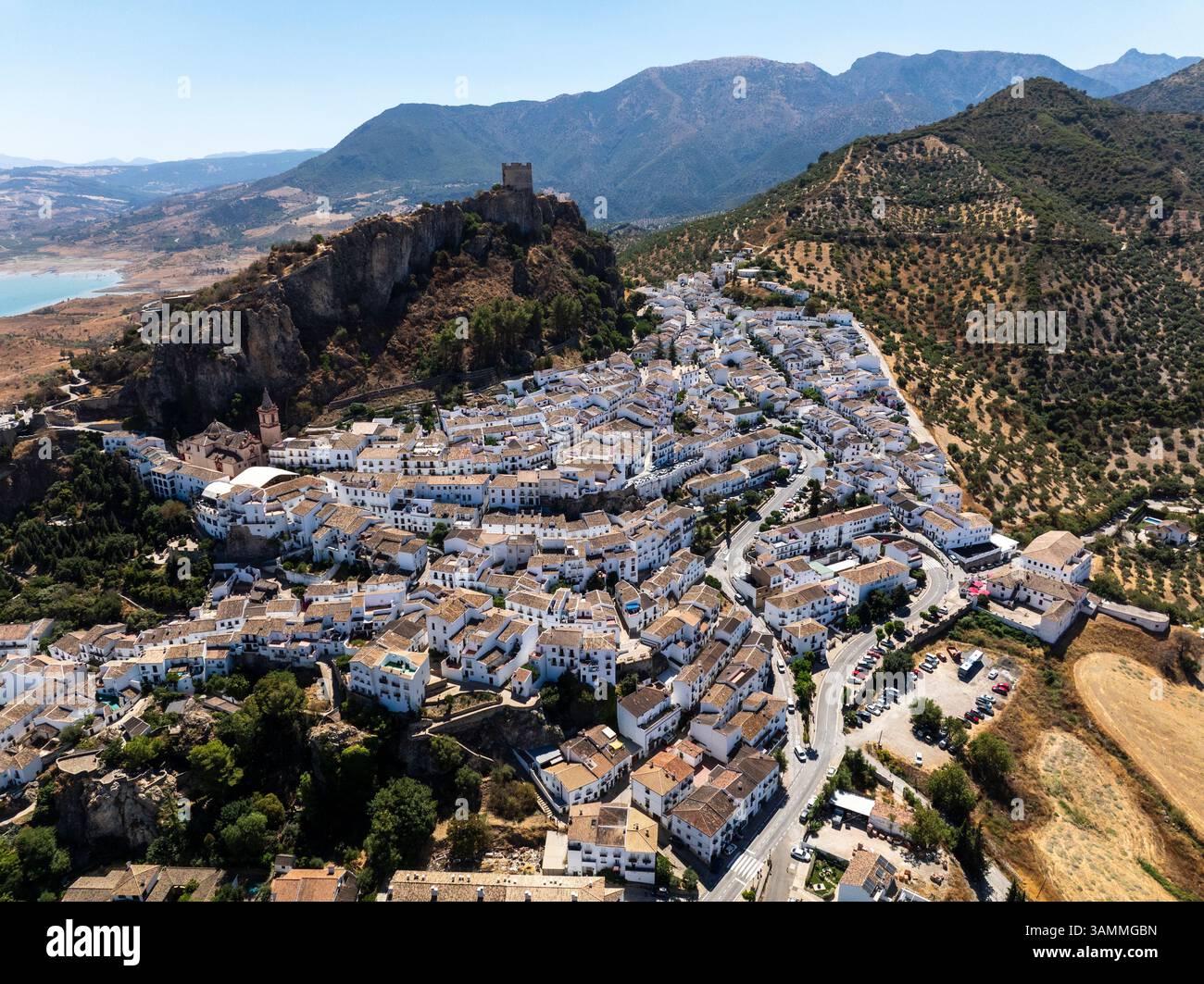Aerial view of picturesque whitewashed buildings and ancient castle on ...