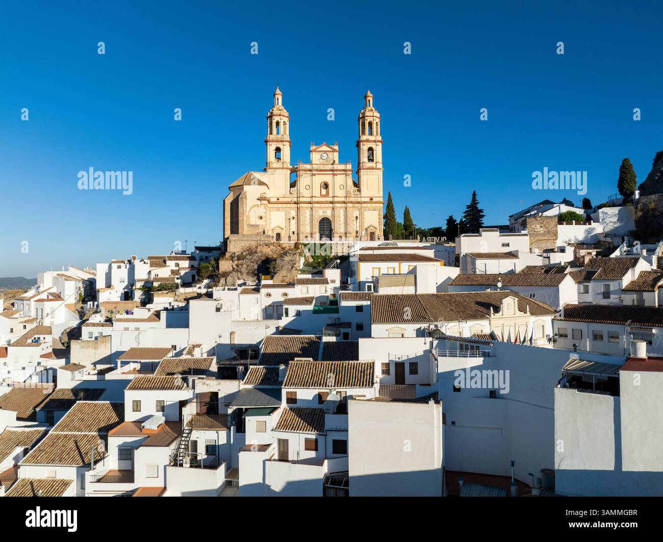 Aerial view of picturesque old town with whitewashed houses and church ...