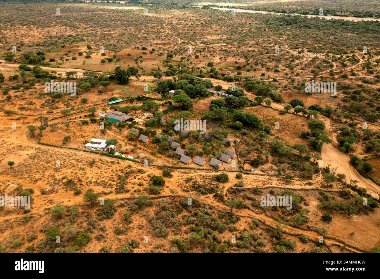 Aerial view of a beautiful rural village surrounded by vast savannah ...