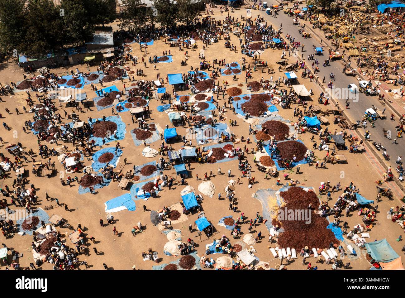 Aerial view of a bustling street market with vibrant vendors and ...