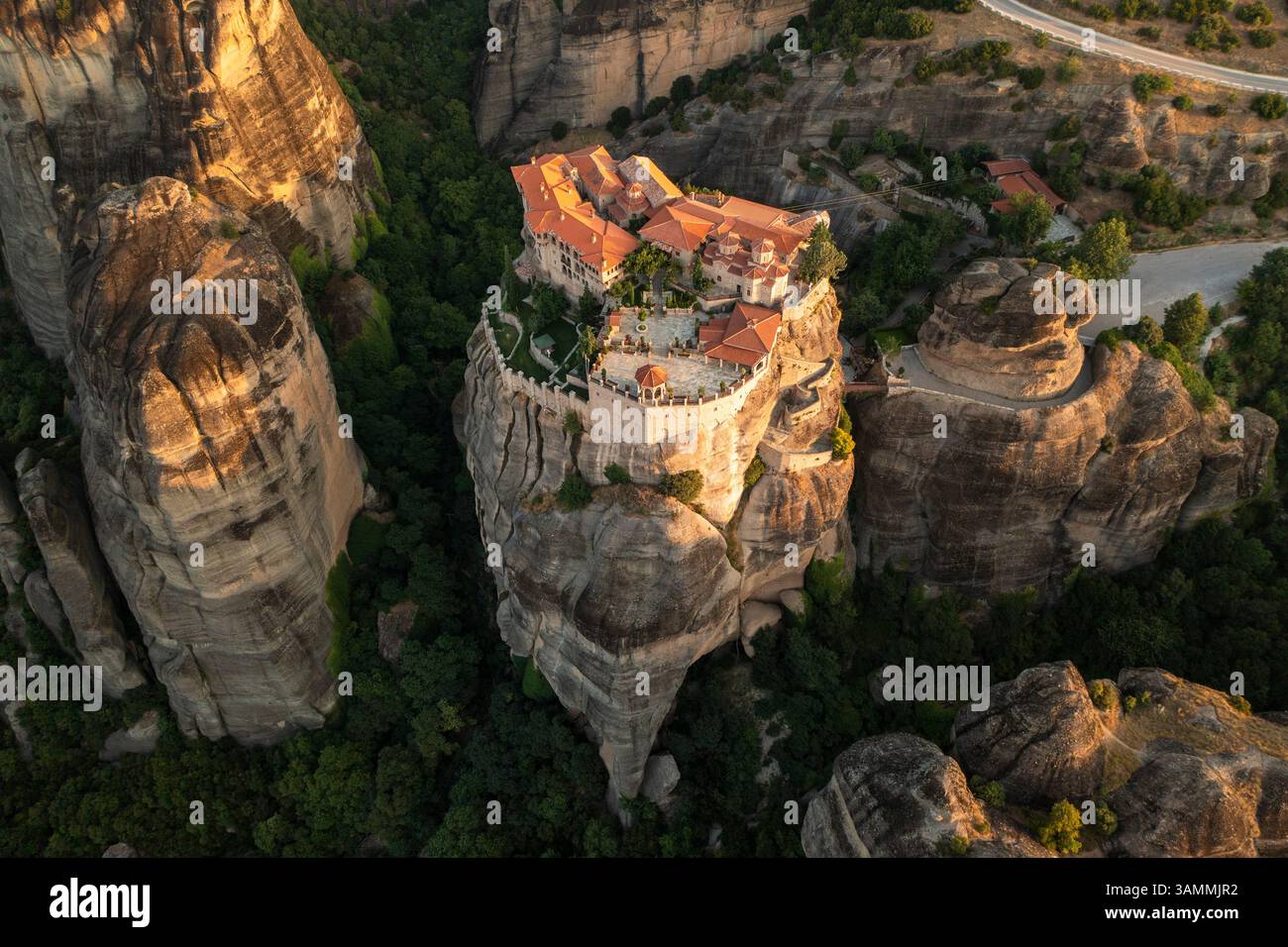 Aerial view of historic monasteries atop limestone rock formations in a ...