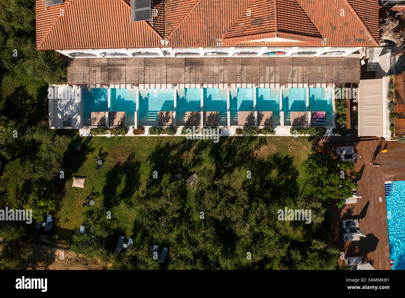 Aerial view of a luxurious resort with a beautiful swimming pool ...