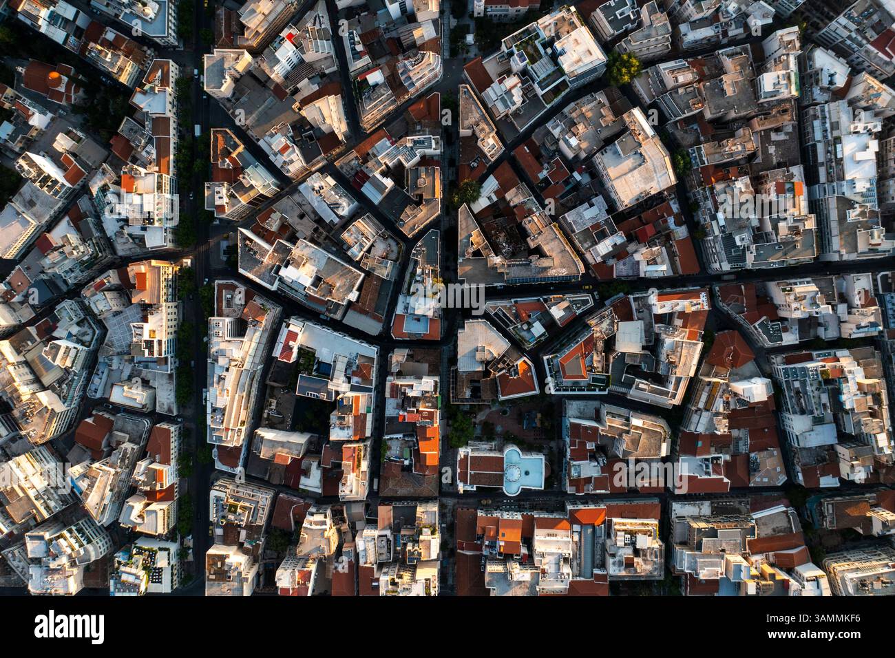Aerial view of beautiful dense urban landscape with organized rooftops ...