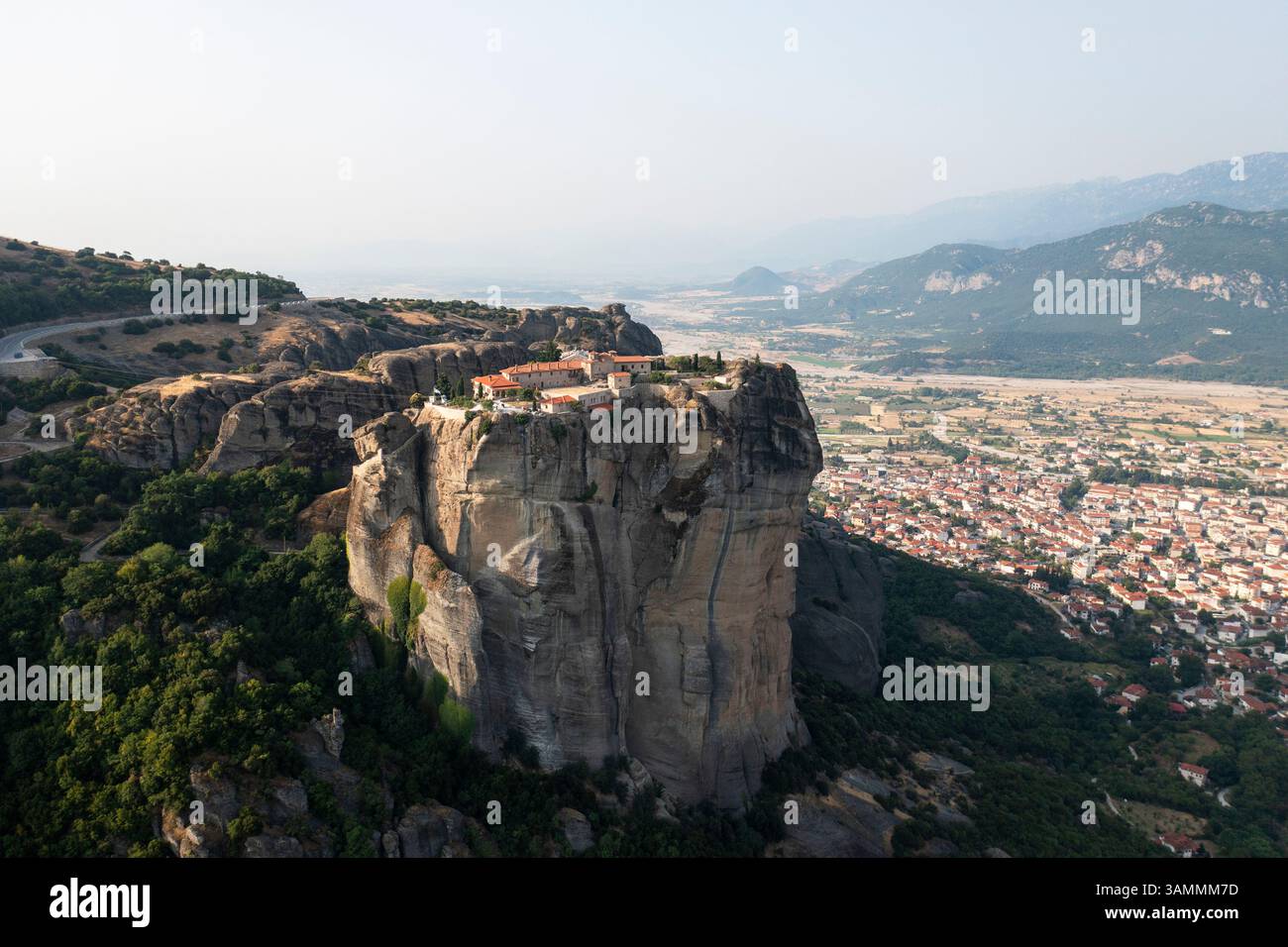 Aerial view of ancient monasteries atop stunning rock formations in a ...
