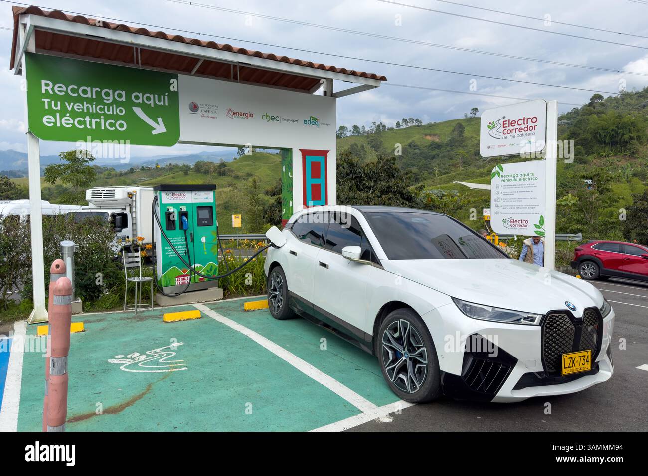 An electric car charging at the Mirador Tambo el Privilegio between ...