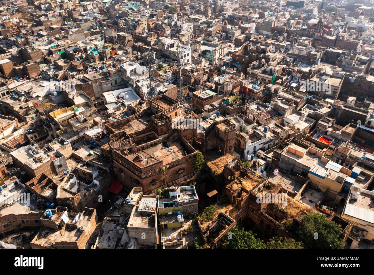 Aerial view of bustling urban rooftops and historic architecture in ...