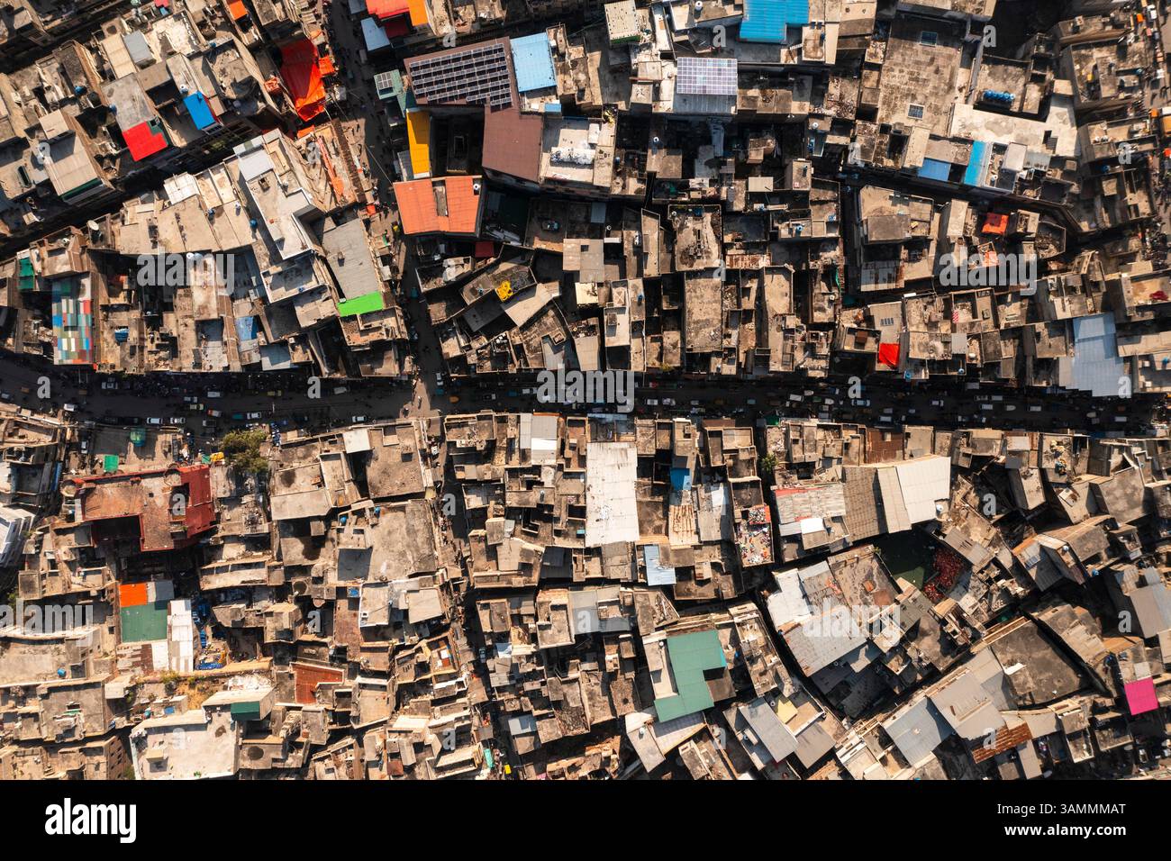 Aerial view of dense urban landscape with organized rooftops and ...