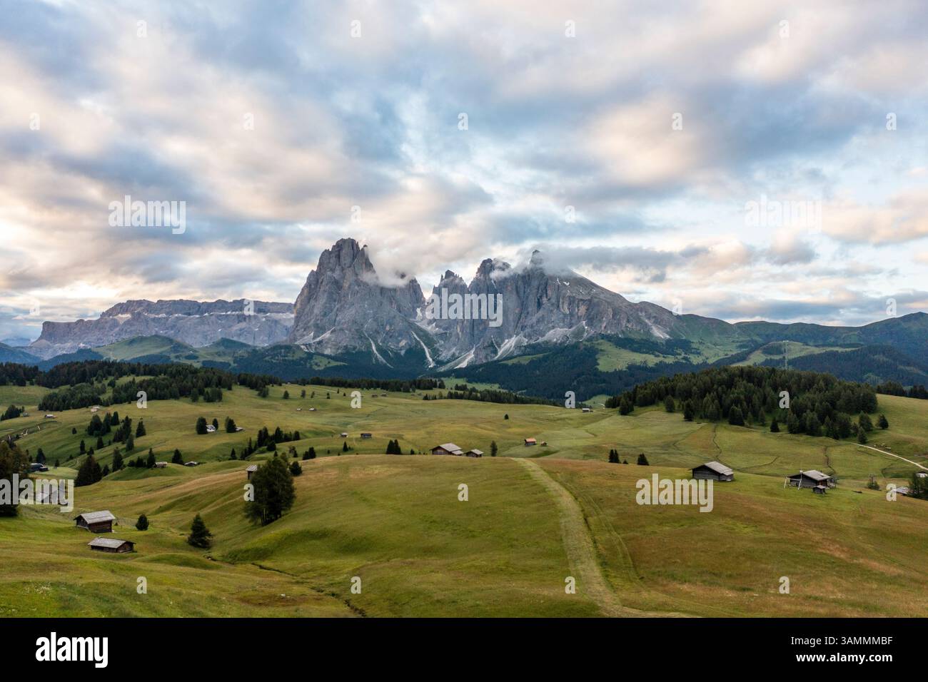 Aerial view of picturesque dolomites with serene meadows and high peaks ...