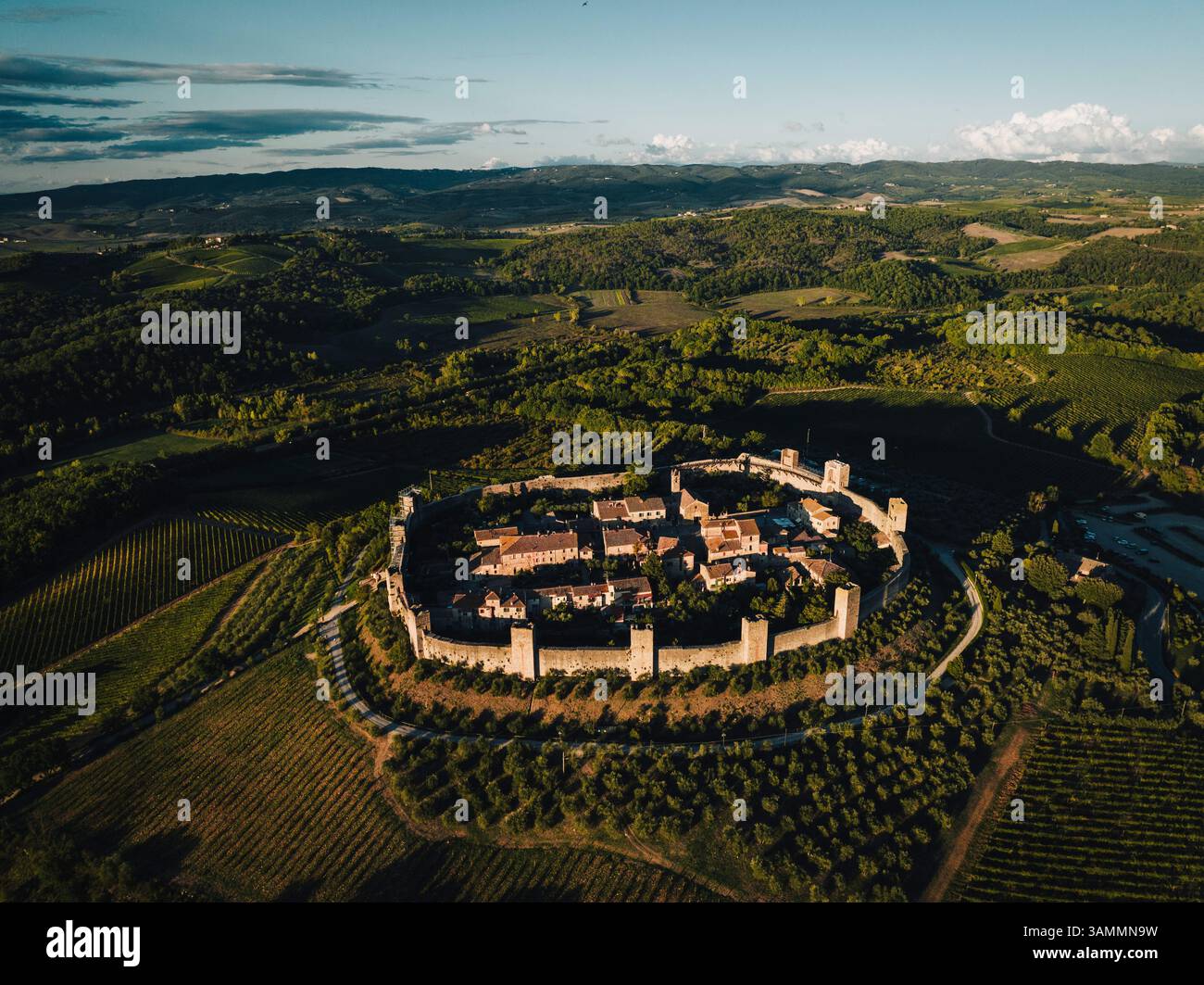 Aerial view of the medieval castle and picturesque village surrounded ...