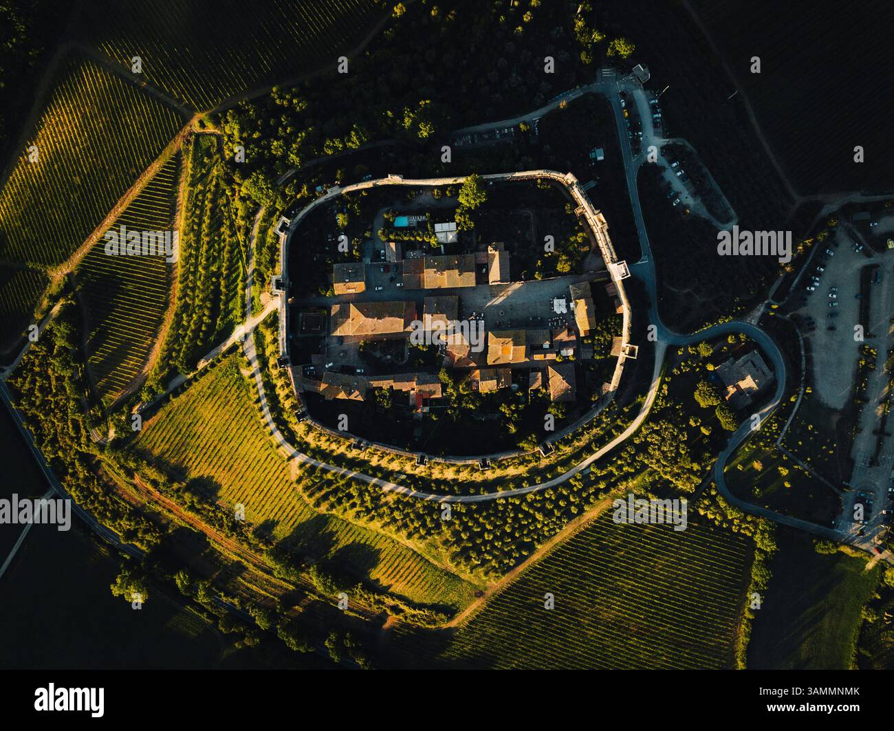 Aerial view of picturesque medieval fortress village surrounded by ...