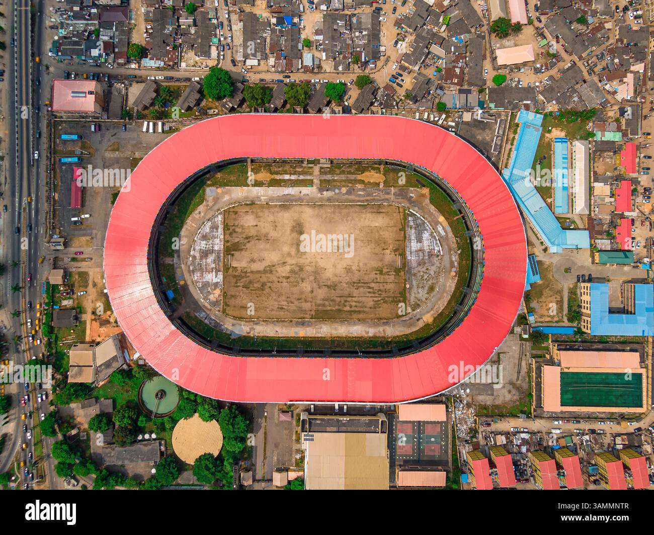 Aerial view of teslim balogun stadium surrounded by urban buildings ...