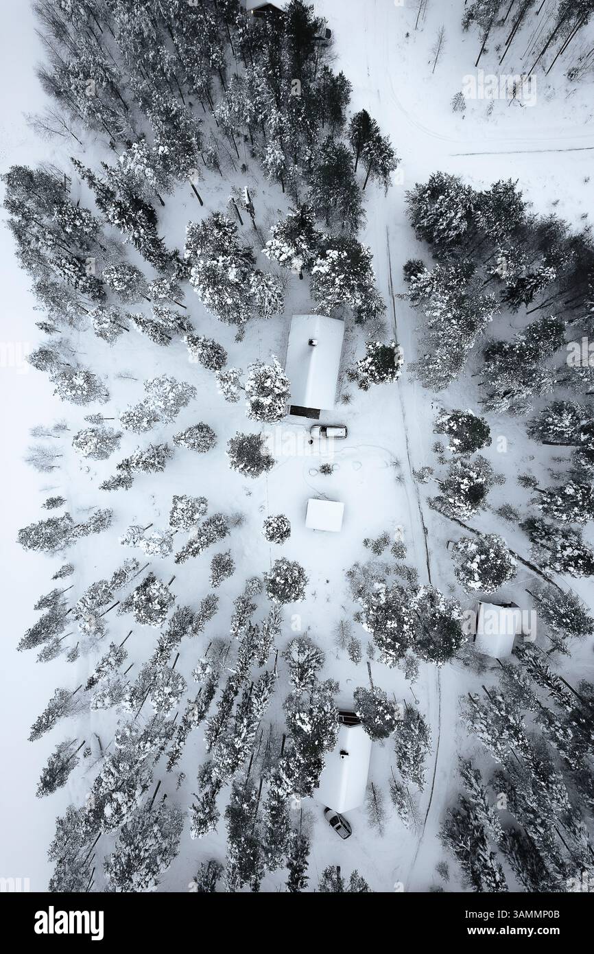 Aerial view of a typical house in a wood near Ruka, Region of Lapland ...