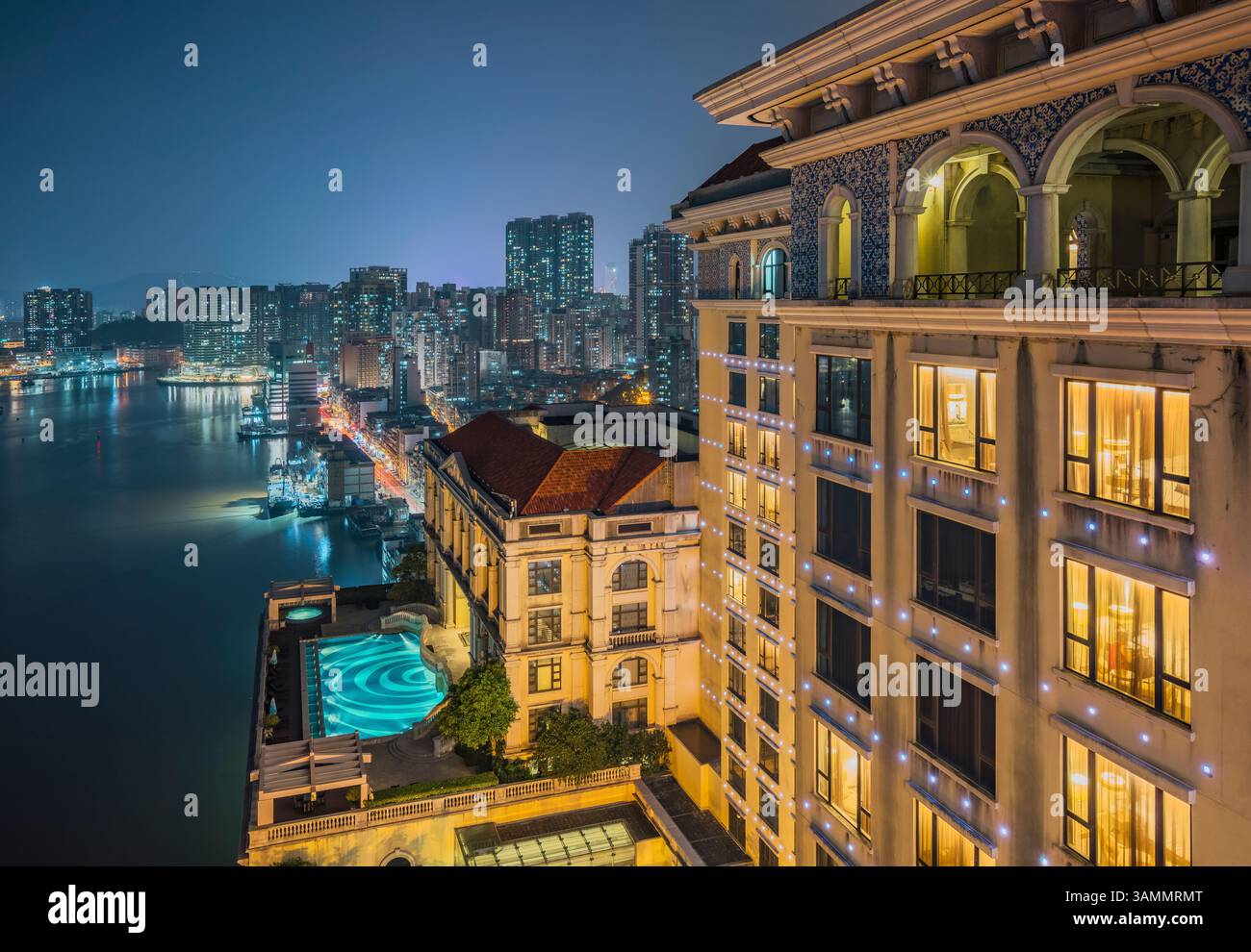 Aerial view of Macau skyline at night along Pearl River Delta, China ...