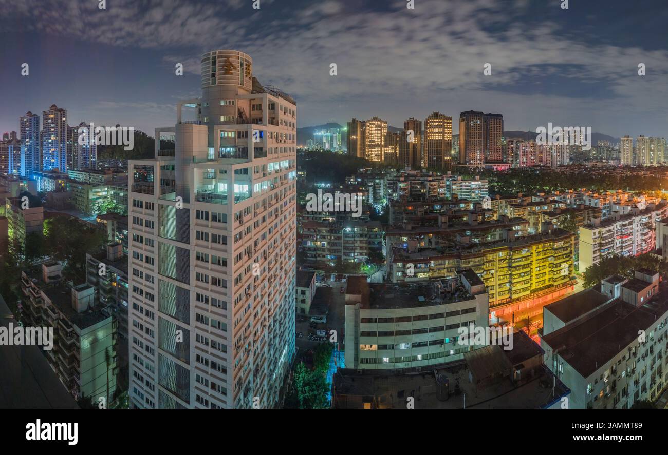 Aerial view of Shenzhen skyline with tall buildings at night, Guangdong ...