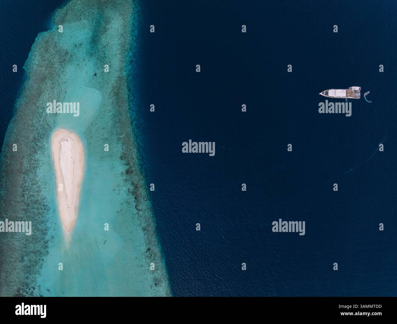 Aerial view of beautiful tropical island with turquoise waters and ...