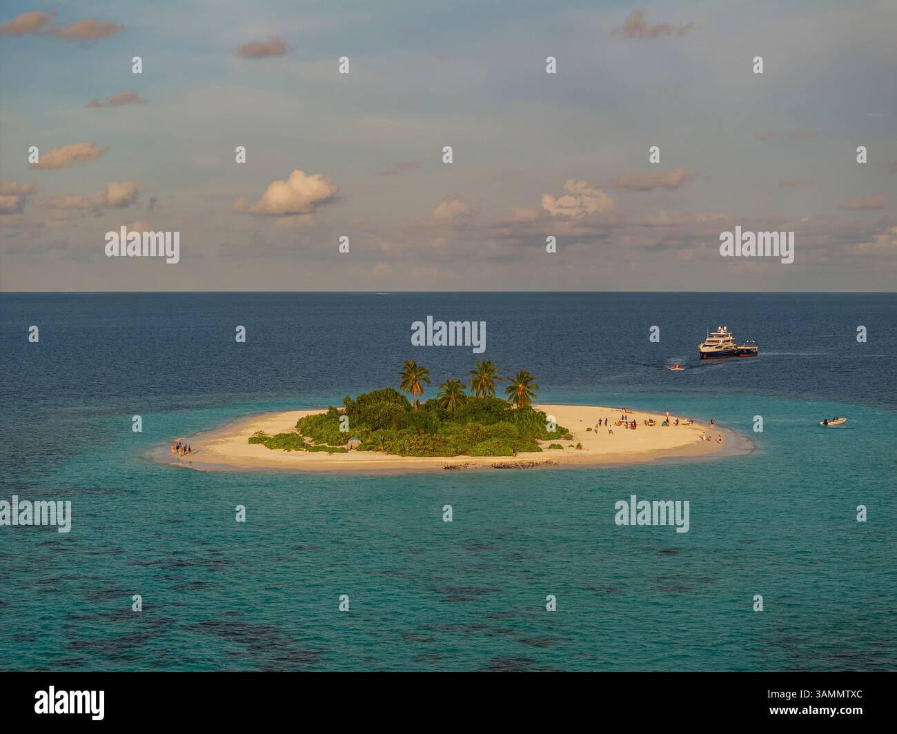 Aerial view of idyllic tropical island with turquoise ocean and sandy ...