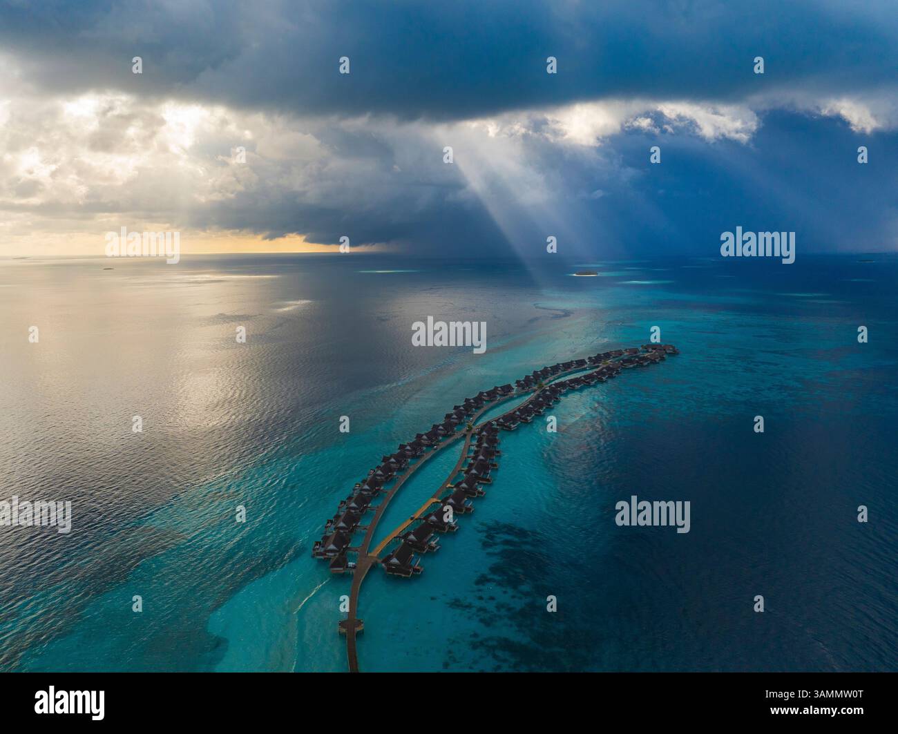 Aerial view of Muravandhoo Island with beautiful turquoise waters and ...