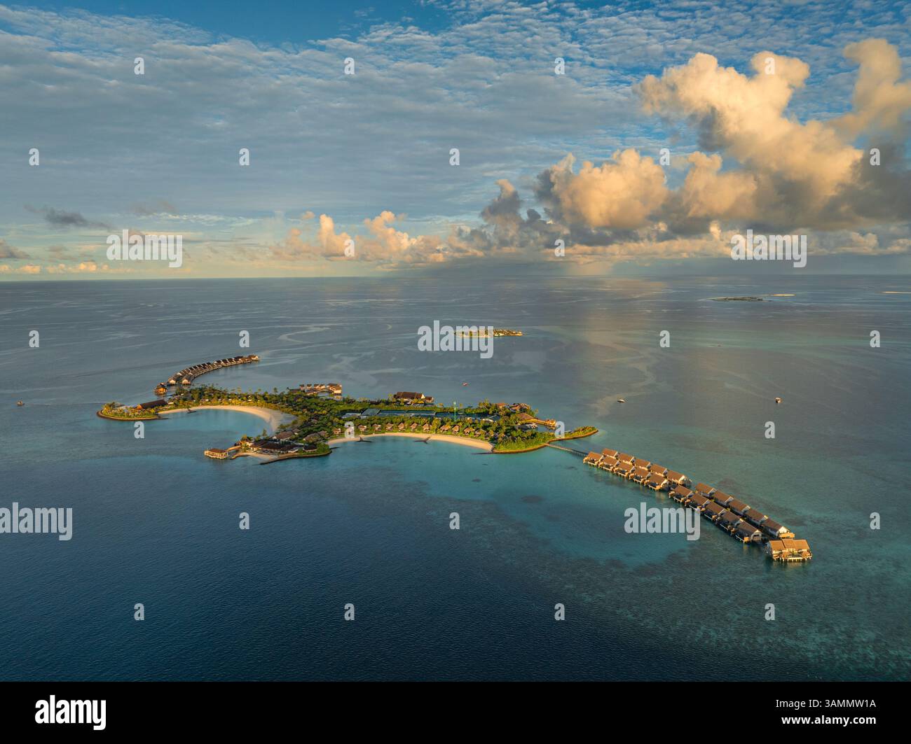 Aerial view of idyllic Amingiri island with luxury resort and beautiful ...