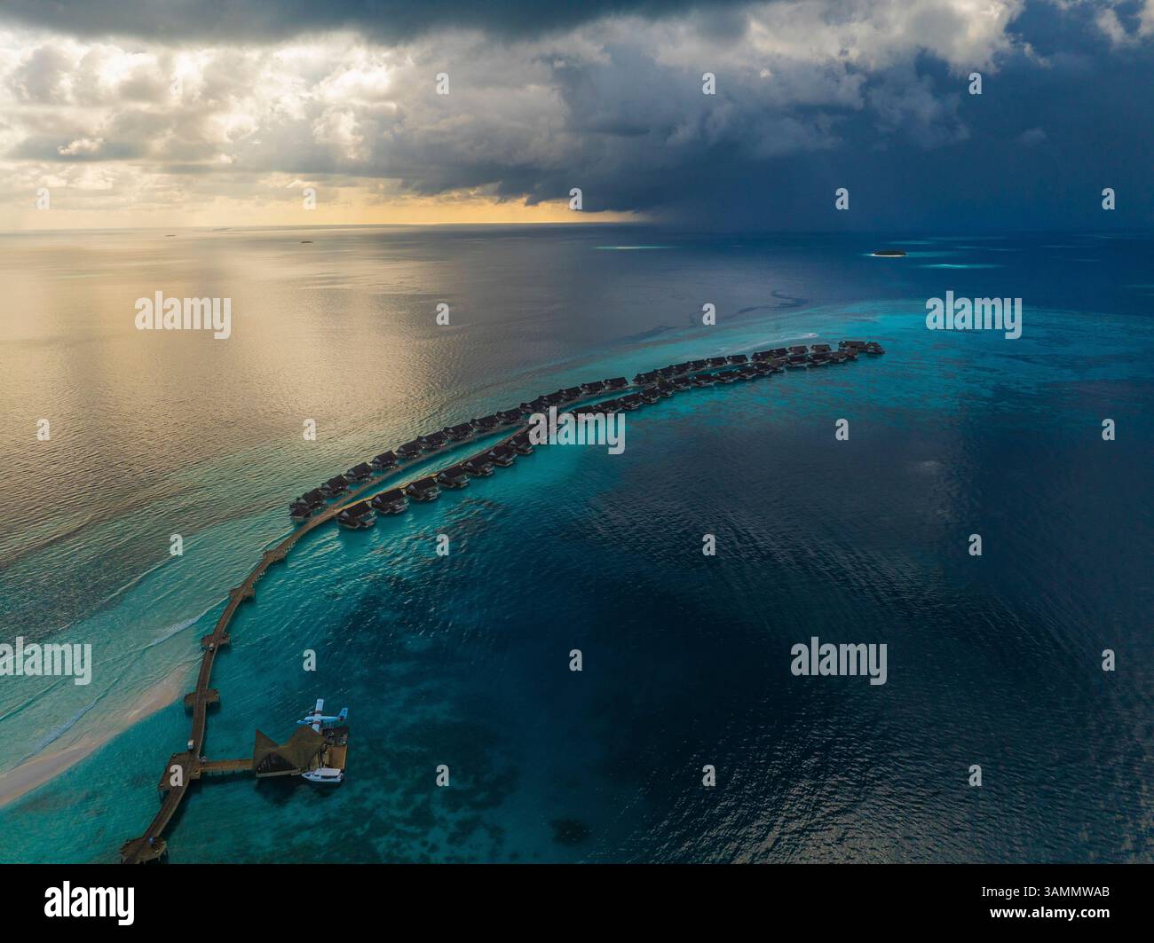 Aerial view of Muravandhoo Island with beautiful bungalows and ...