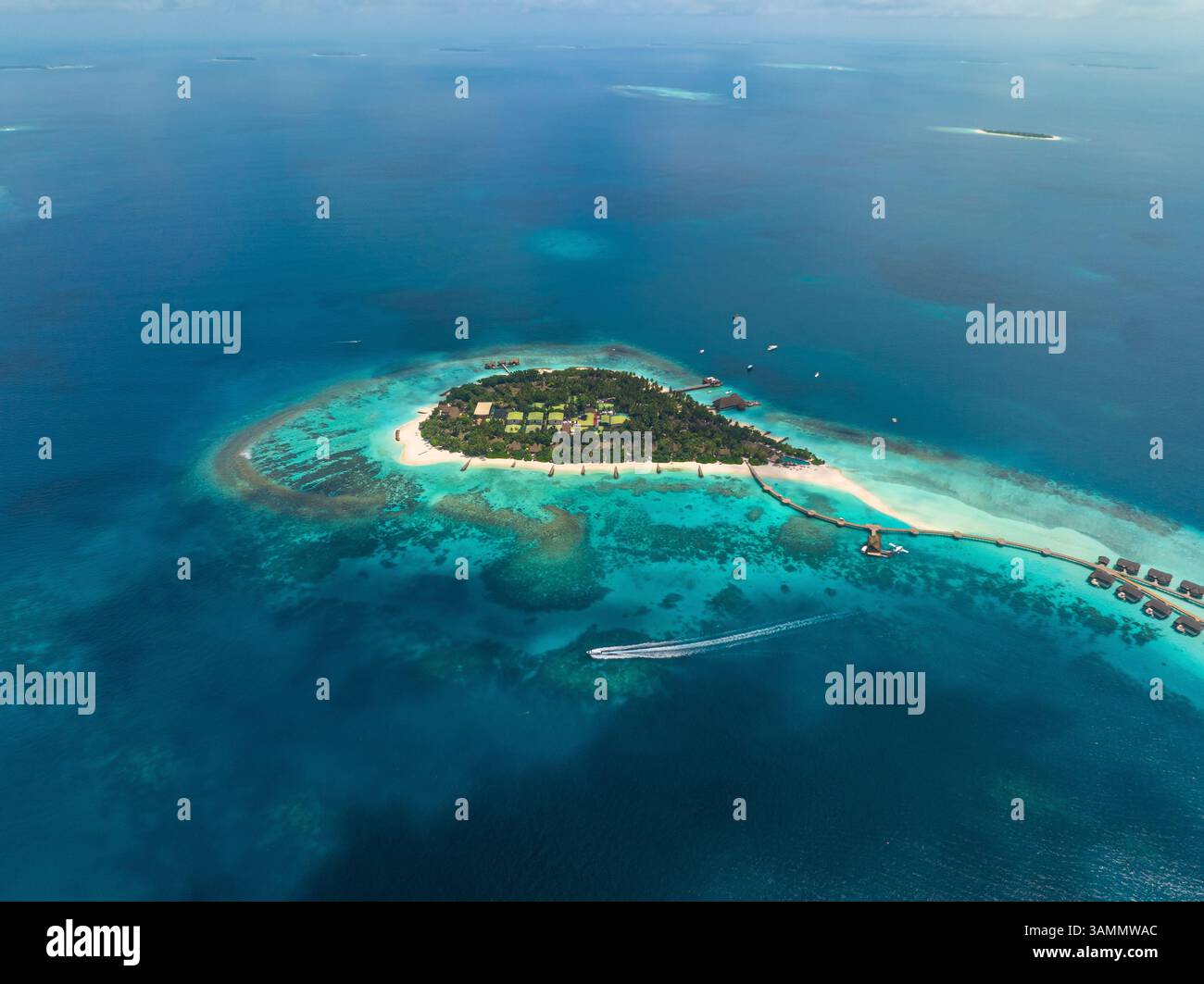 Aerial view of Muravandhoo Island with beautiful tropical beach and ...