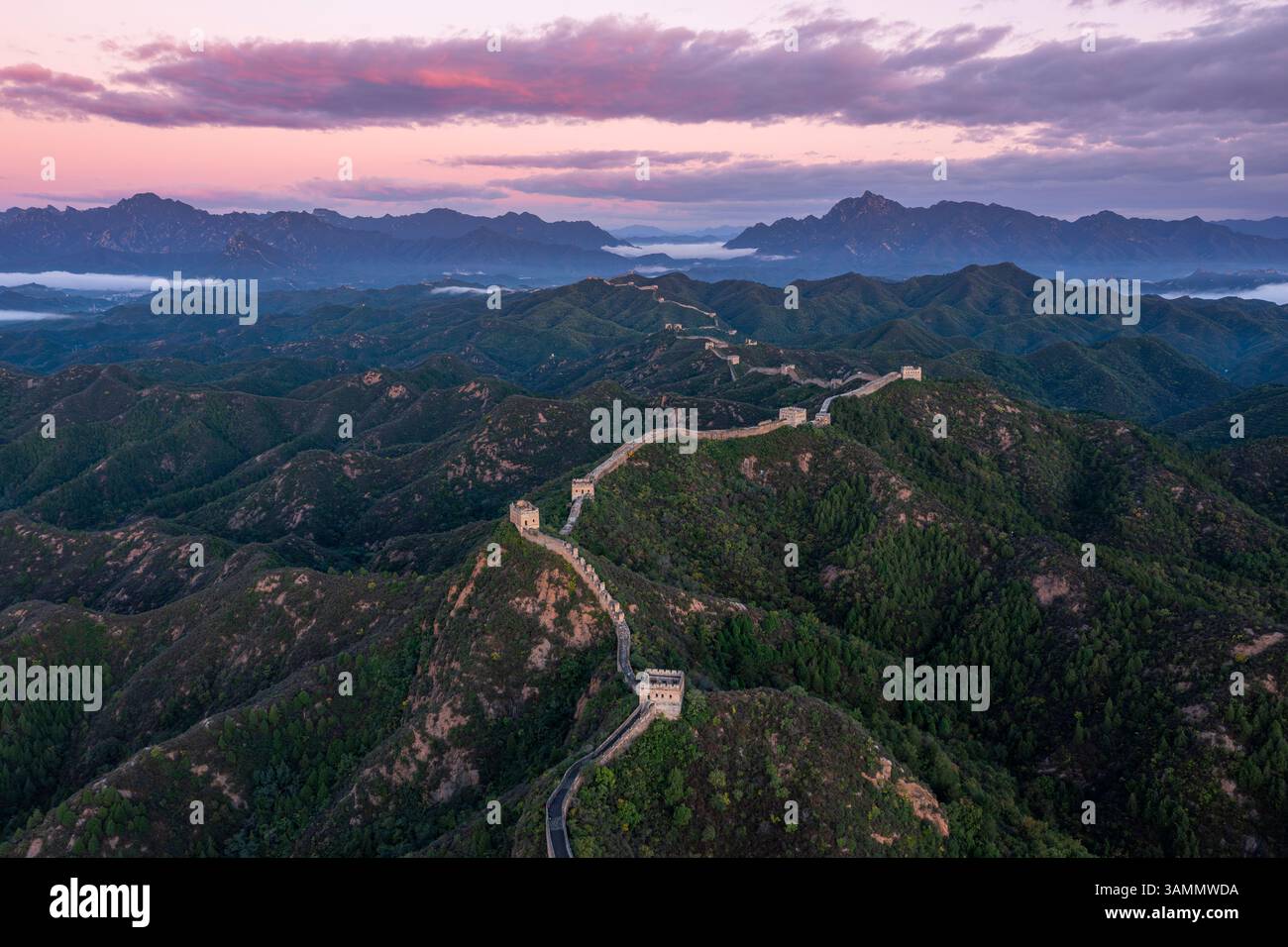 Aerial view of majestic Jinshanling Great Wall amidst scenic mountains ...